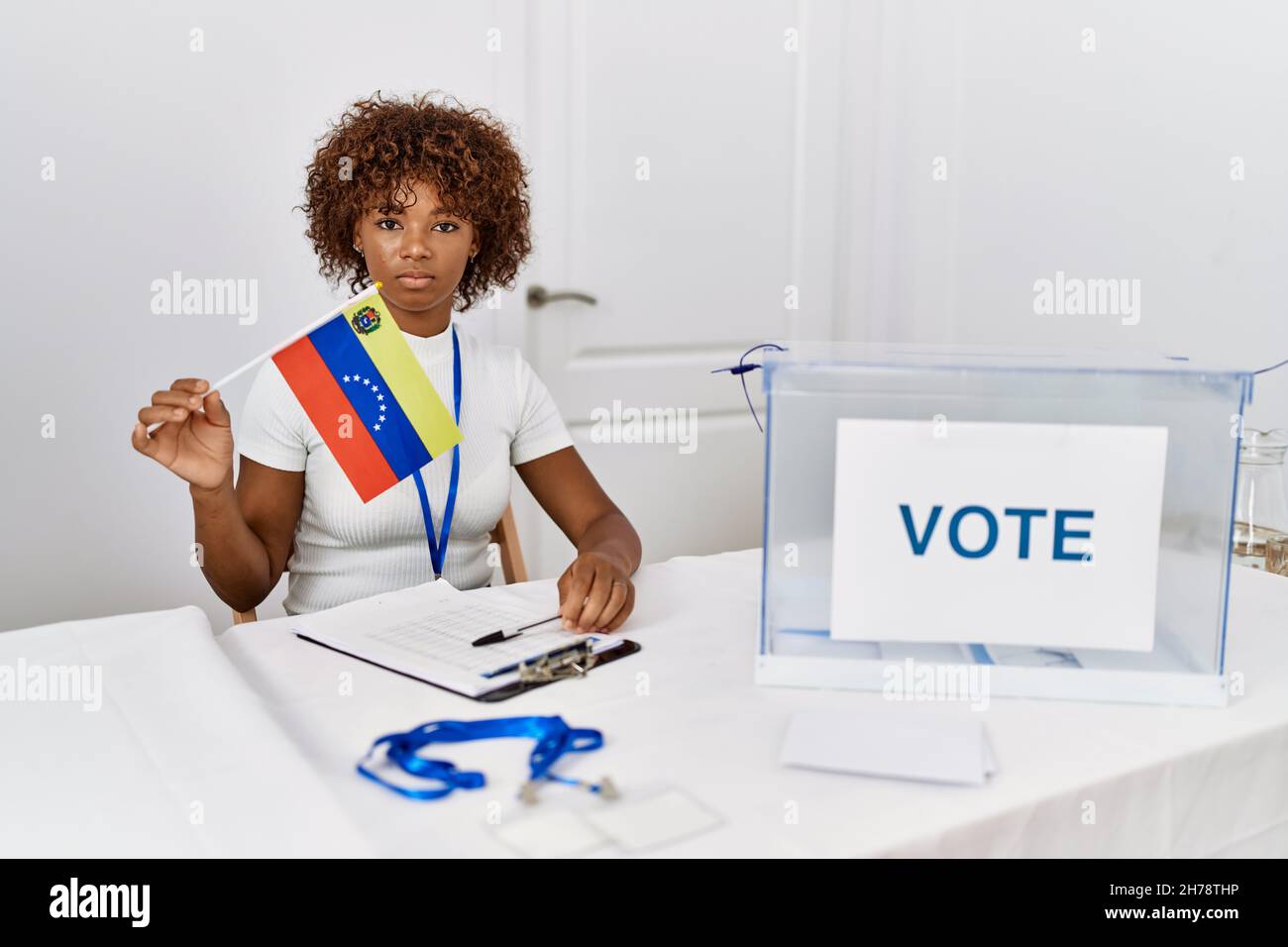 Young african american woman at political campaign election holding ...