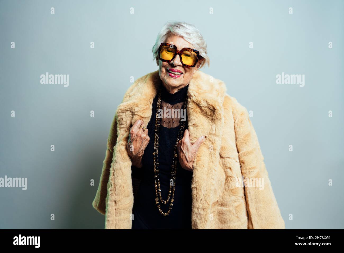 image of a beautiful and elegant old influencer woman. Cool grandmother ...
