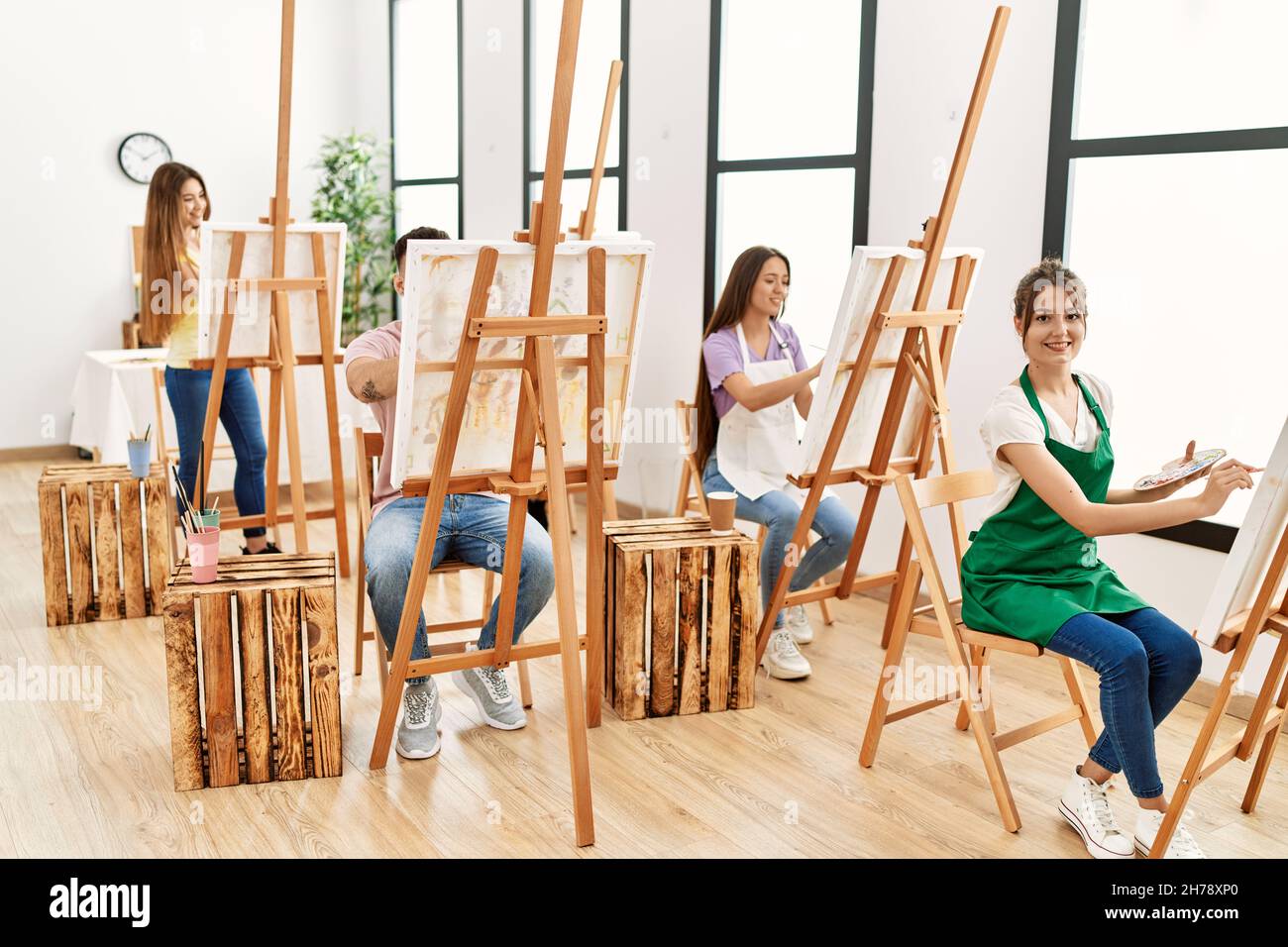 Group of people smiling happy drawing at art studio Stock Photo - Alamy