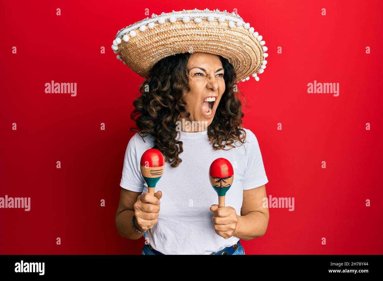 Old woman playing maracas hi-res stock photography and images - Alamy