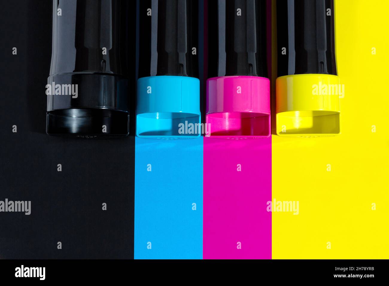 A set of toner cartridges for a color laser printer on the background ...