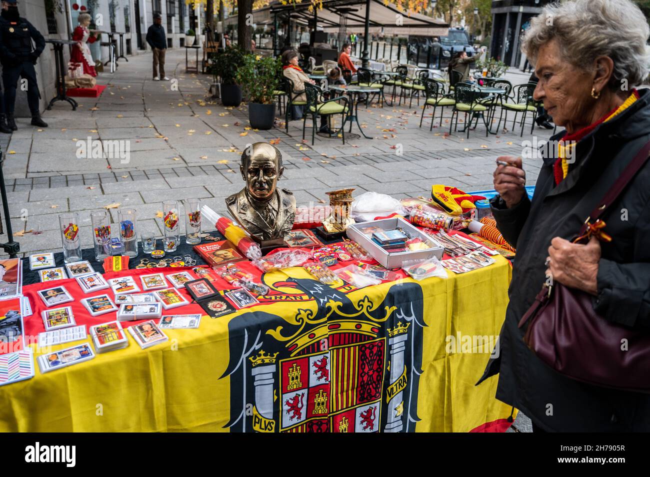 Madrid, Spain. 21st Nov, 2021. A woman looks a statue of Francisco ...