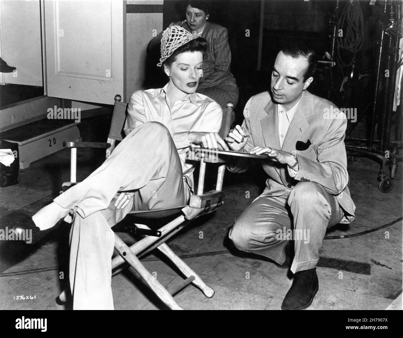 KATHARINE HEPBURN and Director VINCENTE MINNELLI on set candid during ...