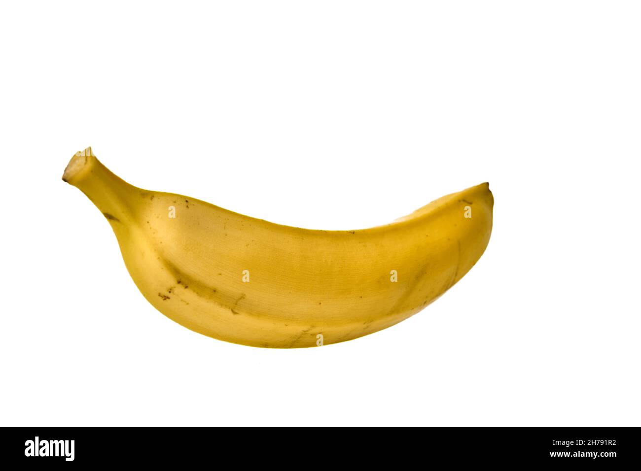 Single banana isolated on a white background Stock Photo - Alamy