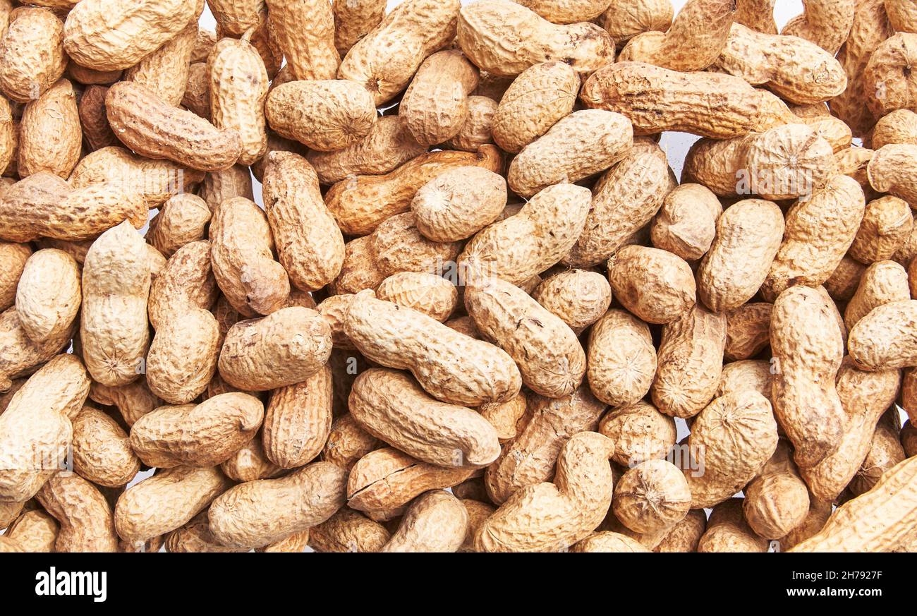 Bunch of peanuts with shell texture Stock Photo - Alamy