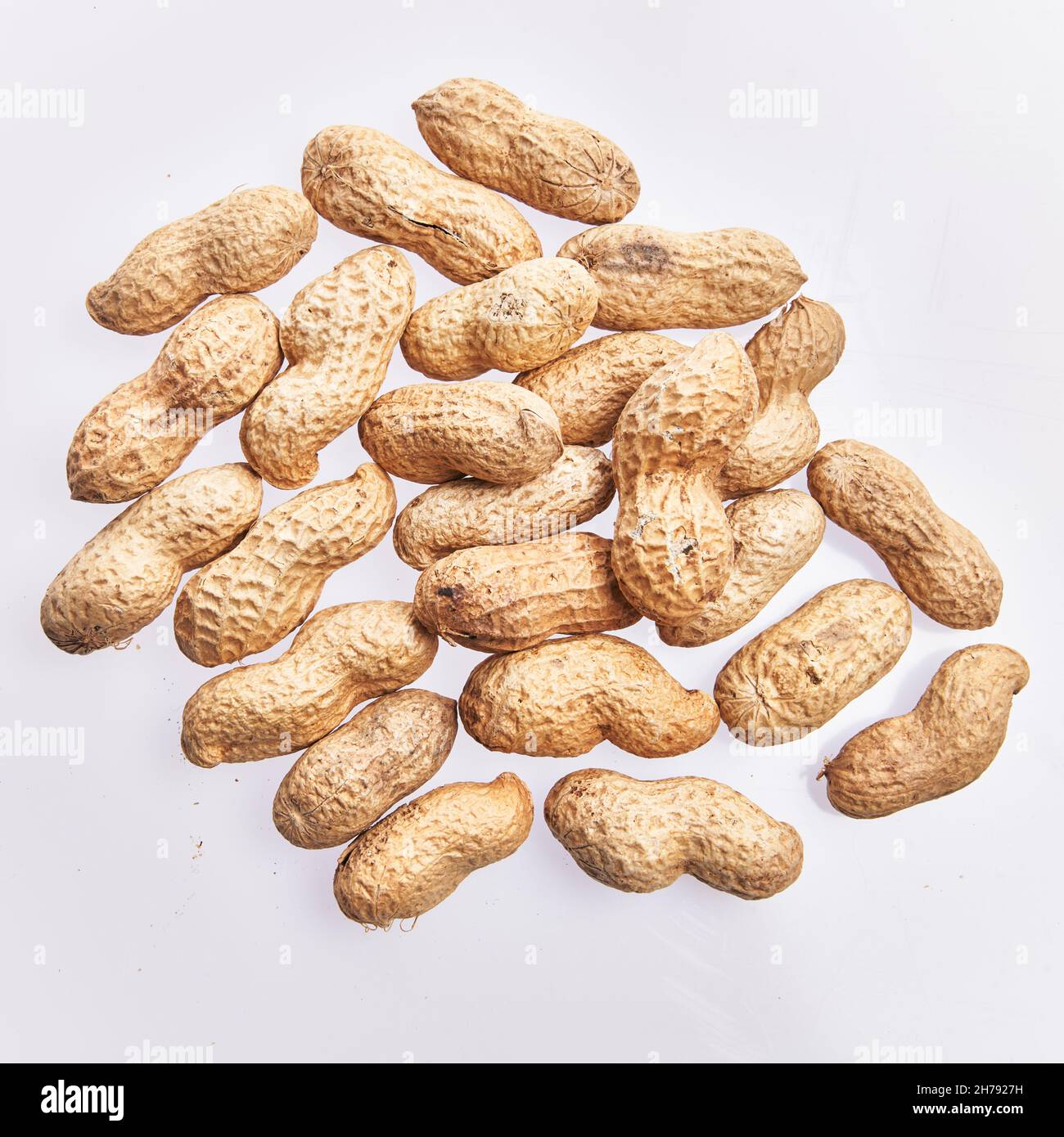 Bunch of peanuts with shell isolated on a white background Stock Photo ...