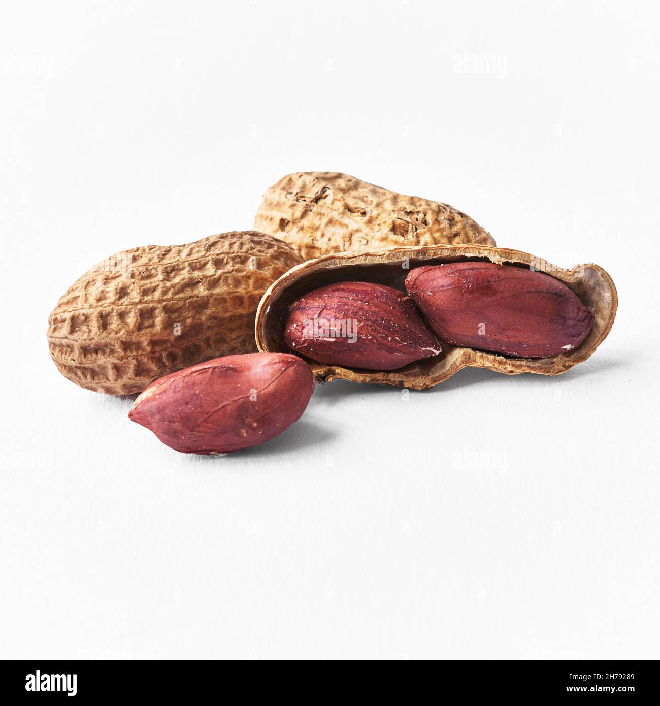Bunch of peanuts isolated on a white background Stock Photo - Alamy