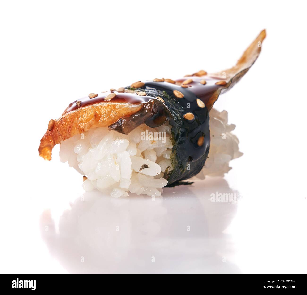 Single unagi nigiri sushi isolated on white background Stock Photo - Alamy