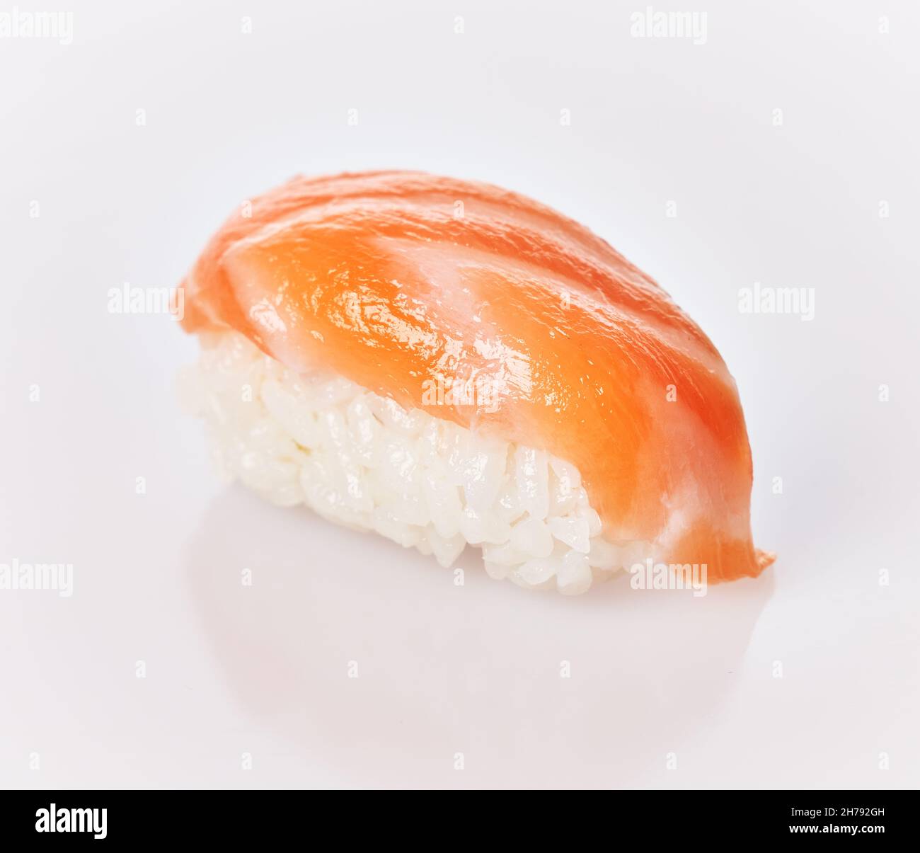 Single salmon nigiri sushi isolated on white background Stock Photo - Alamy