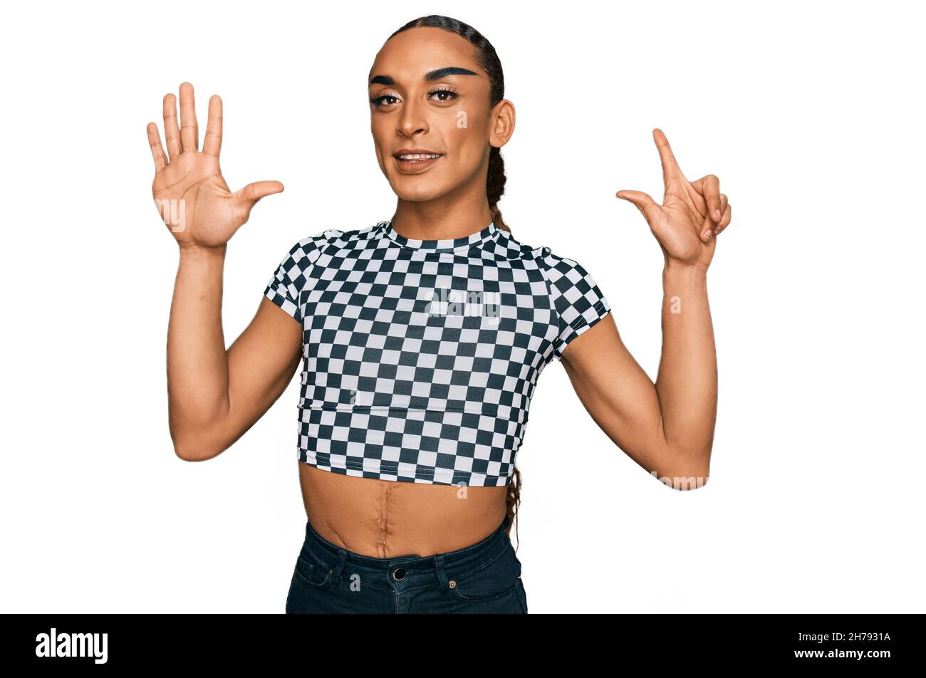 Hispanic transgender man wearing make up and long hair wearing modern ...