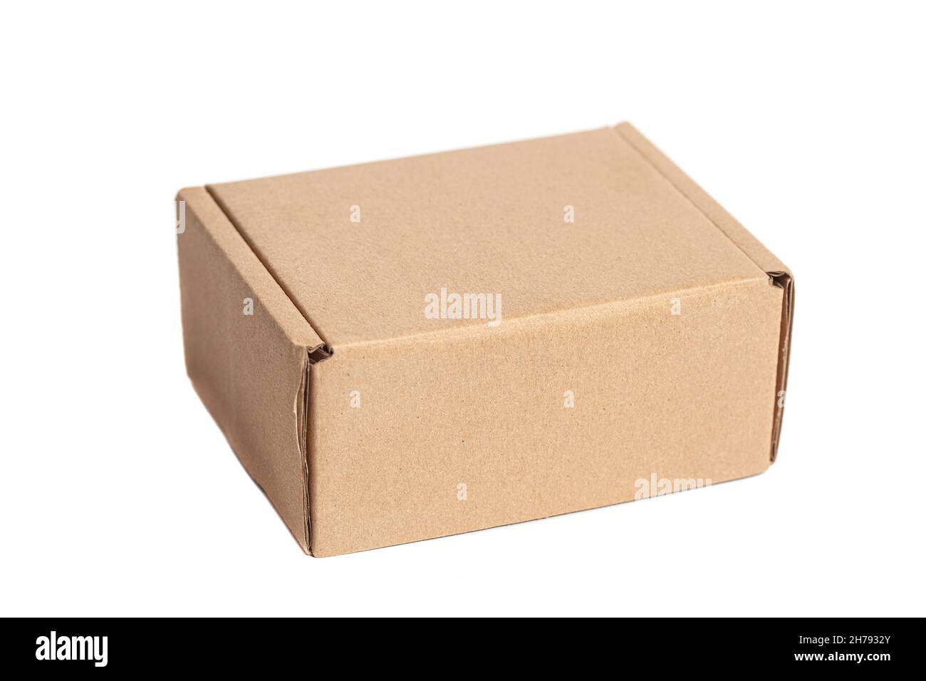 Closed cardboard box isolated on a white background Stock Photo - Alamy