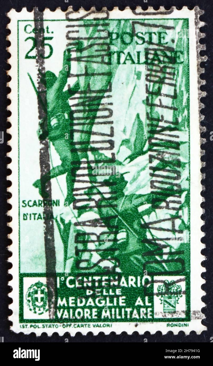 ITALY - CIRCA 1934: a stamp printed in the Italy shows Alpine Infantry ...