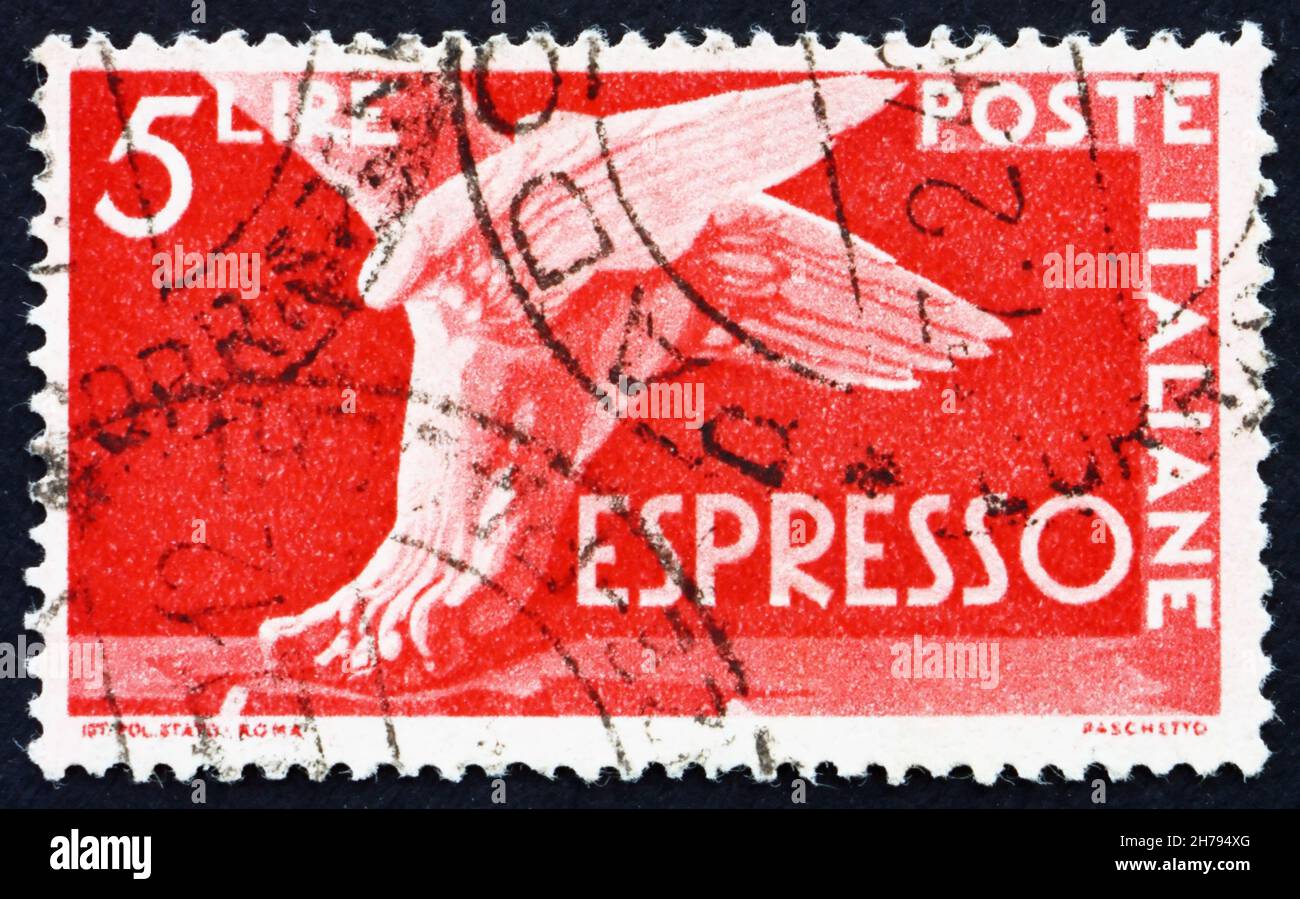 ITALY - CIRCA 1945: a stamp printed in the Italy shows Winged Foot ...