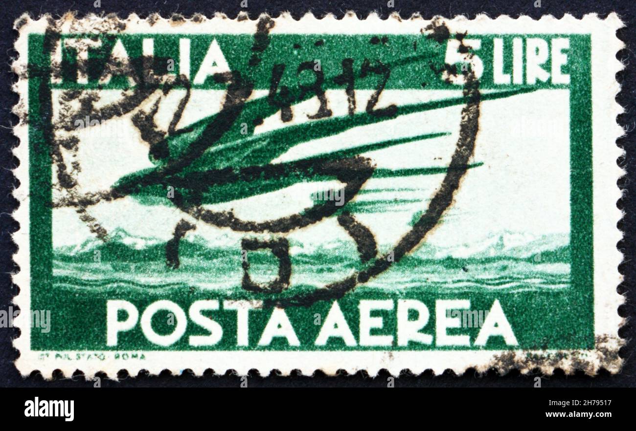 ITALY - CIRCA 1945: a stamp printed in the Italy shows Swallows in ...