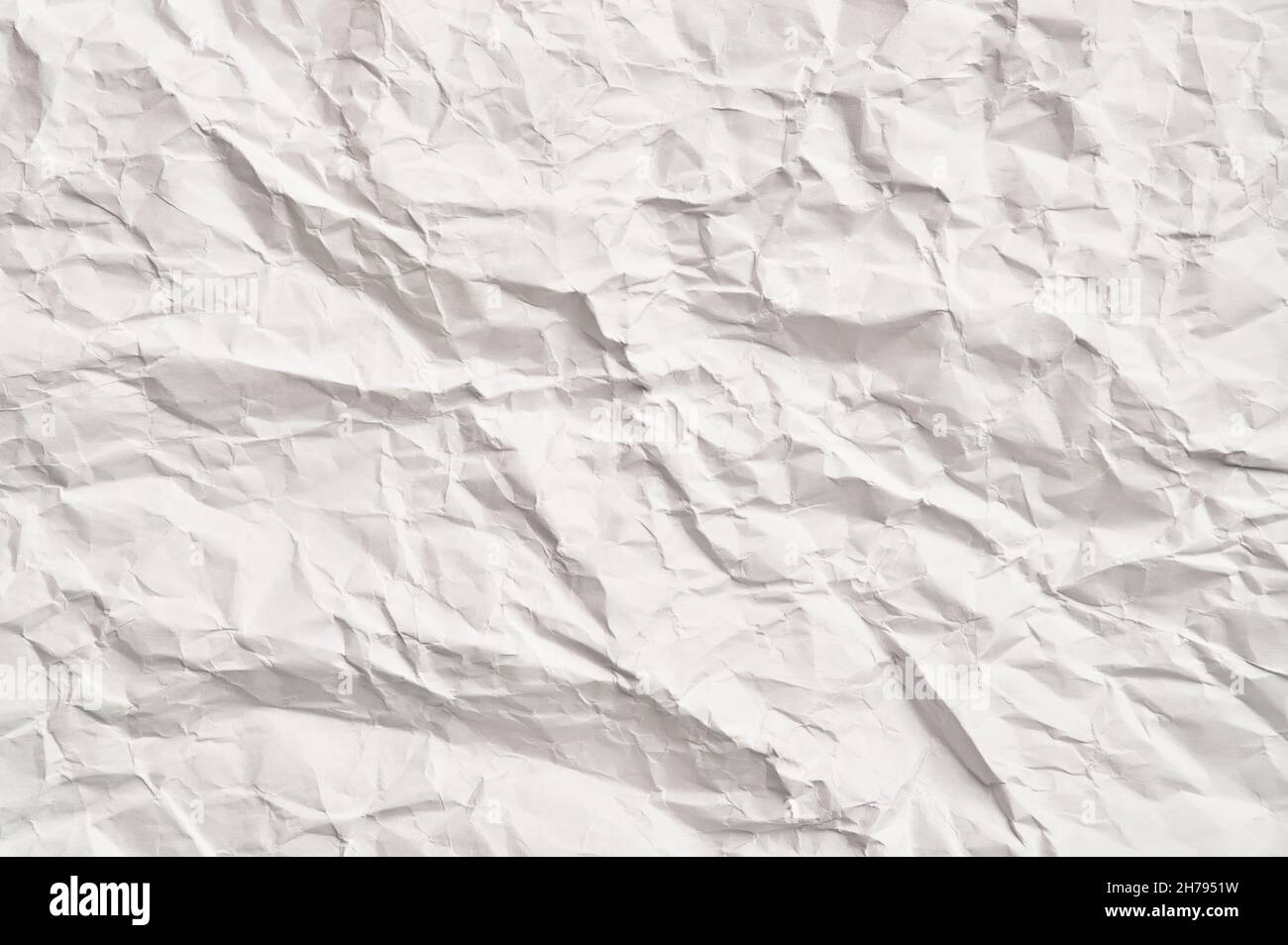 White crumpled paper texture with wrinkles. Damaged and torn sheet ...