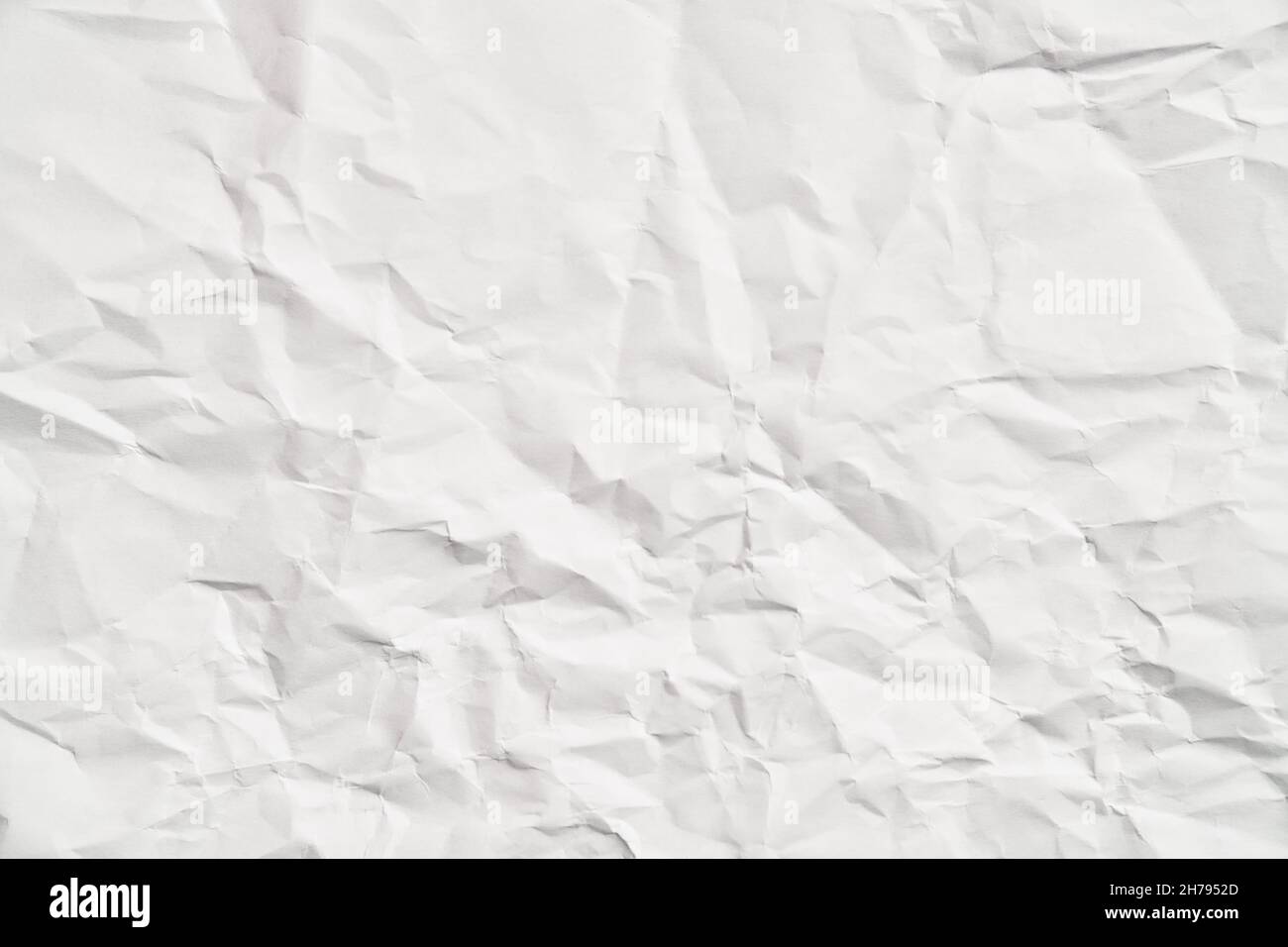 White crumpled paper texture with wrinkles. Damaged and torn sheet ...