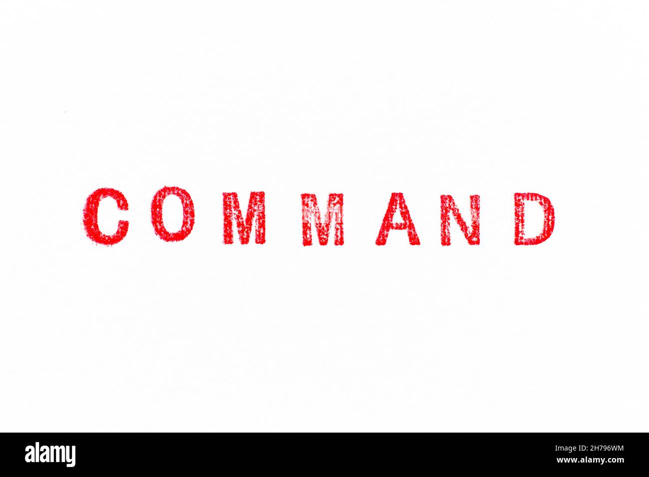 Red color rubber stamp in word command on white paper background Stock ...