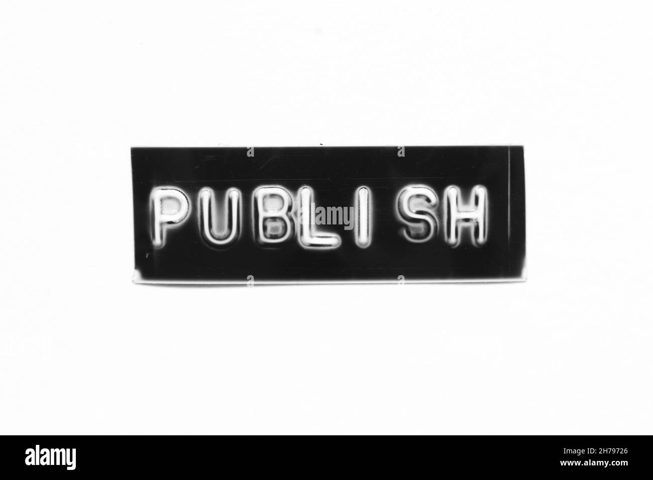 Black color banner that have embossed letter with word publish on white ...