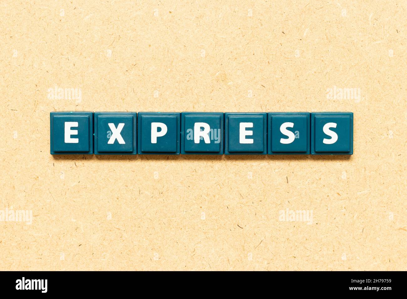 Tile alphabet letter in word express on wood background Stock Photo - Alamy