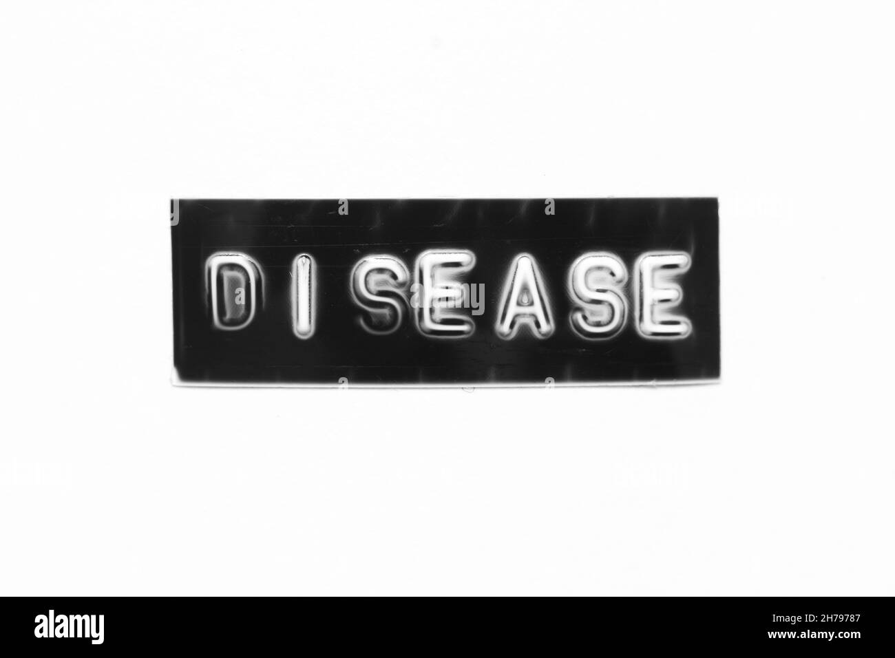 Black color banner that have embossed letter with word disease on white ...