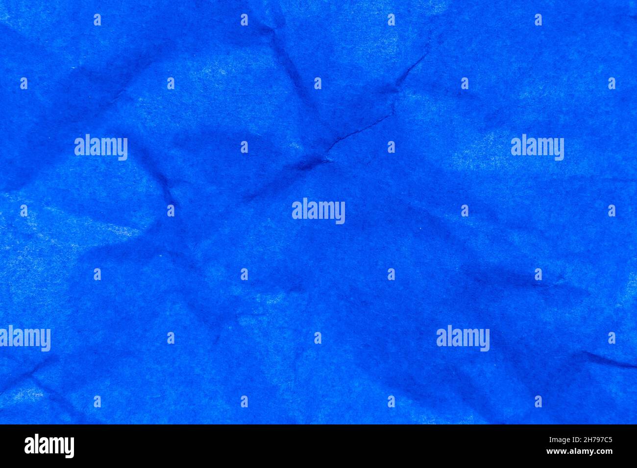 Grunge wrinkled blue color paper textured background Stock Photo - Alamy