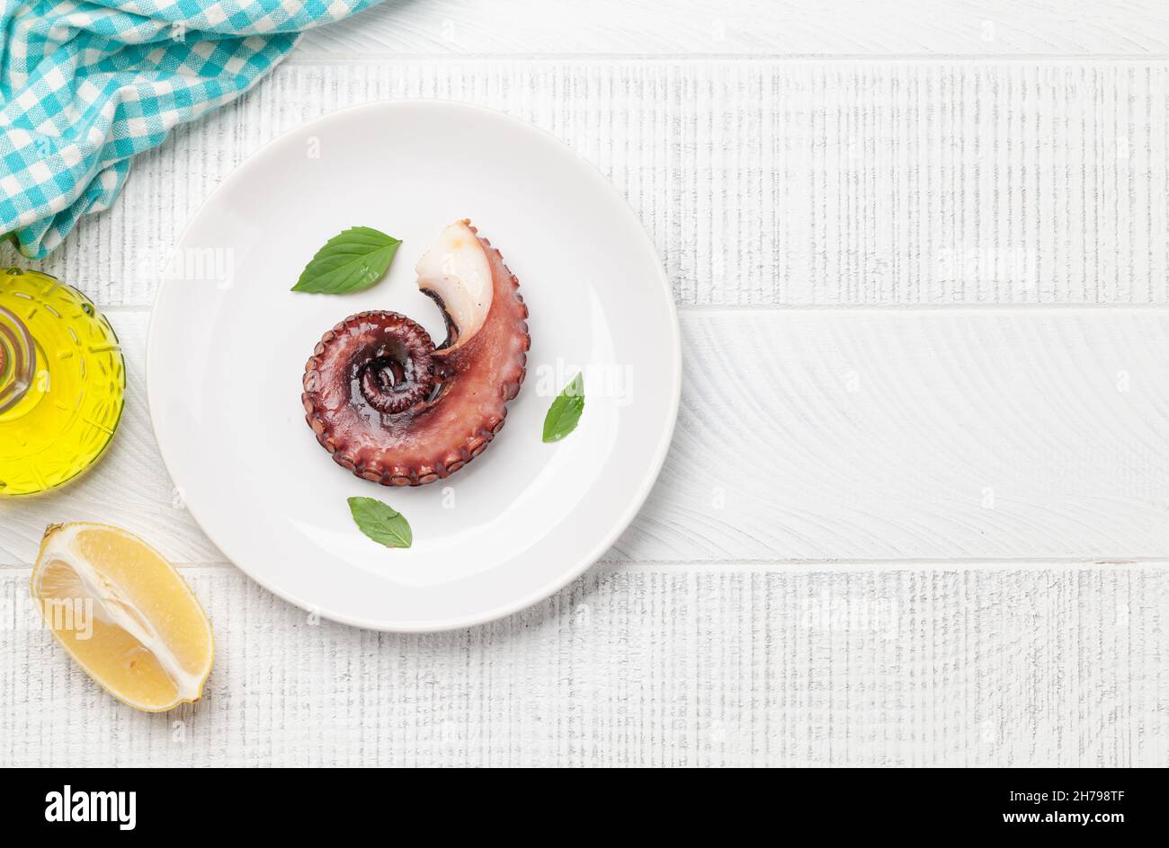 Grilled octopus. Top view flat lay with copy space Stock Photo - Alamy