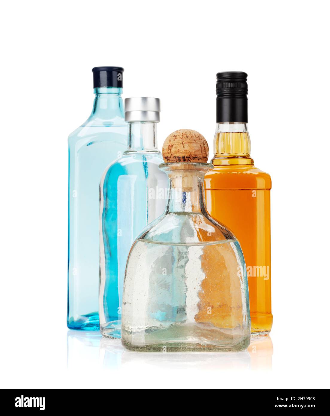 Various hard liquor bottles. Gin, vodka, tequila and whiskey. Isolated ...