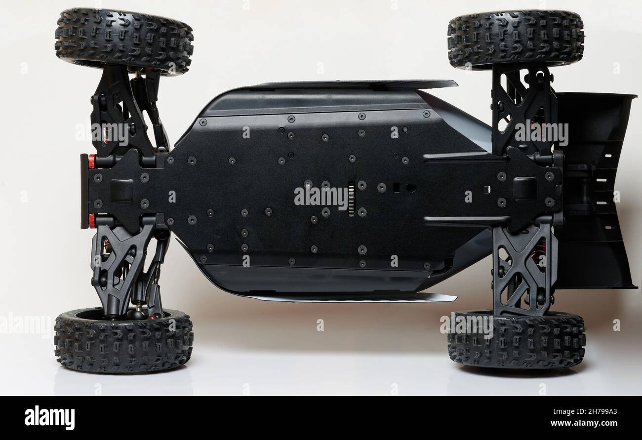 Bottom of rc buggy car with metal black suspension isolated on studio ...