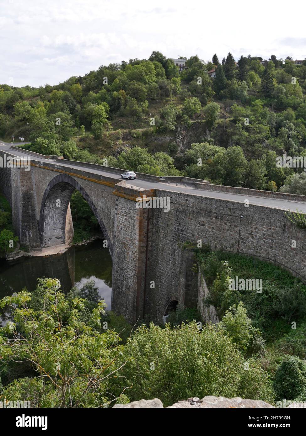 19th century arched bridge over the river Allier, Vieille-Brioude ...