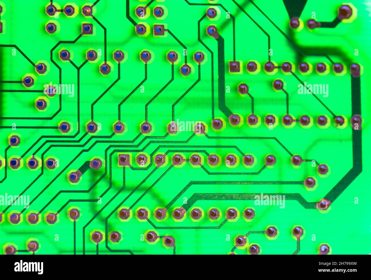 Printed green circuit board close-up. Electronic technology ...