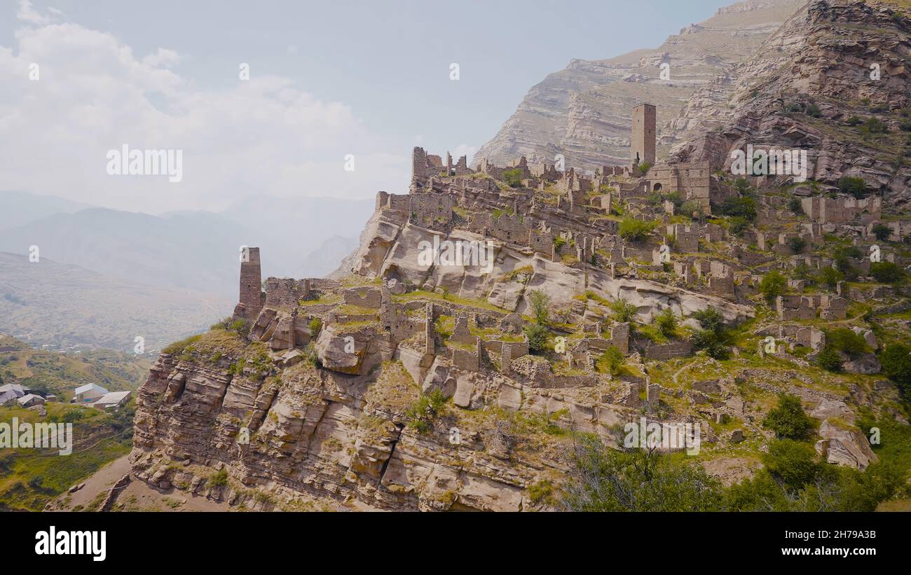 Top view of amazing stone city in mountains. Action. Ancient stone city ...