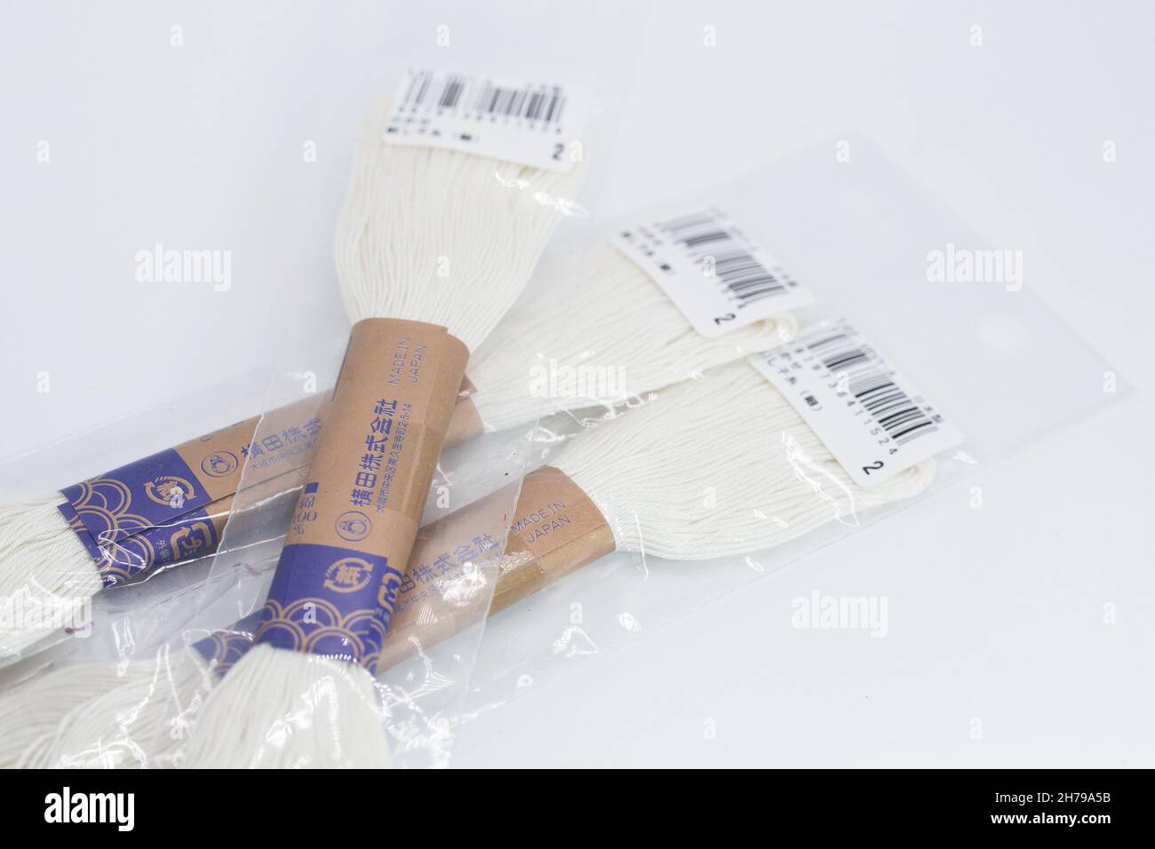 Sashiko (Japanese embroidery) thread in packages, on a white background ...