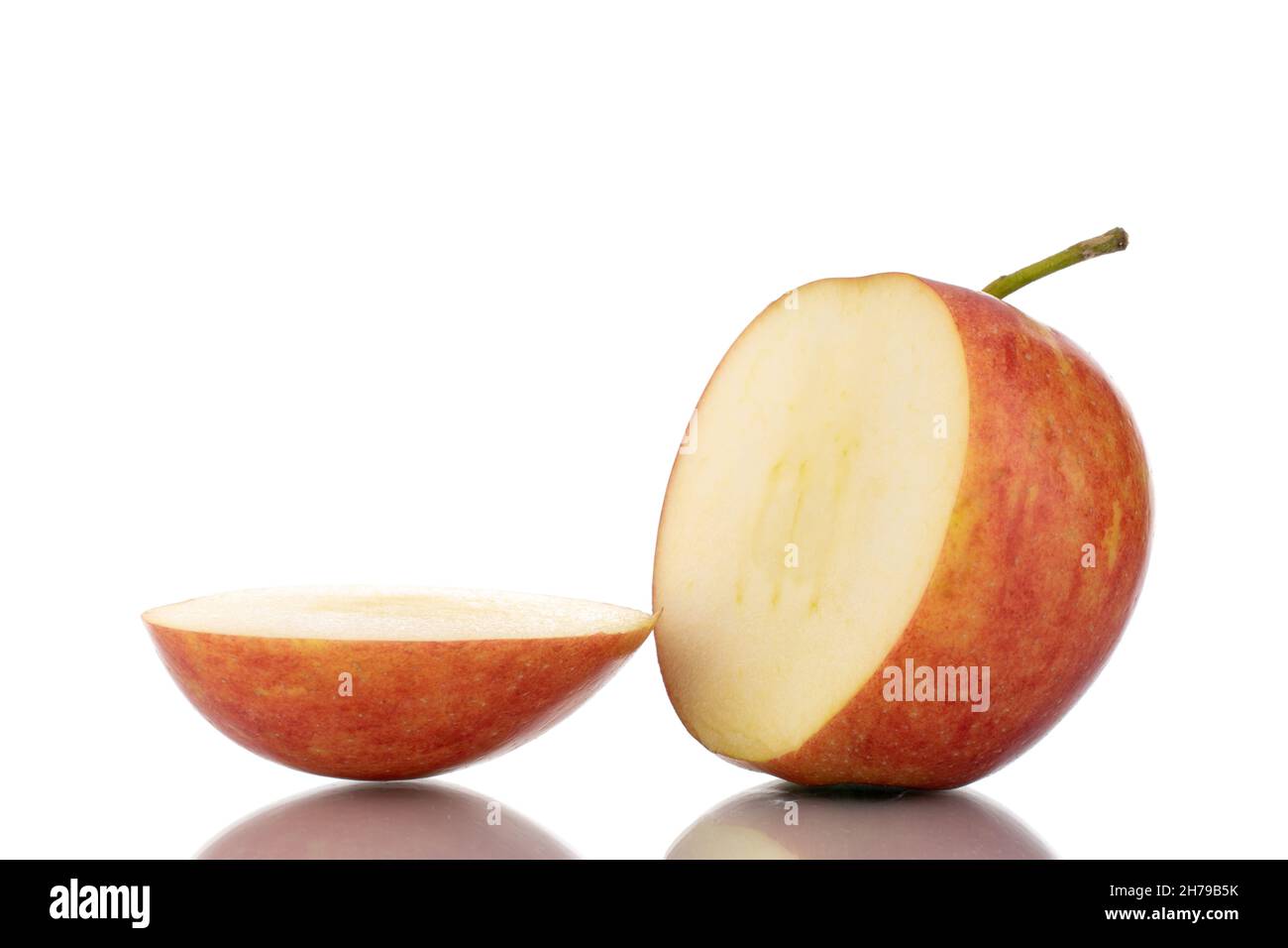 One sweet red cut apple, close-up, isolated on white Stock Photo - Alamy