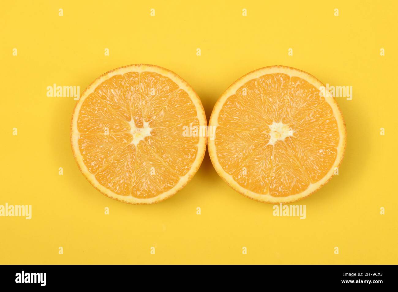 Perfectly retouched orange isolated on yellow. High resolution photo ...