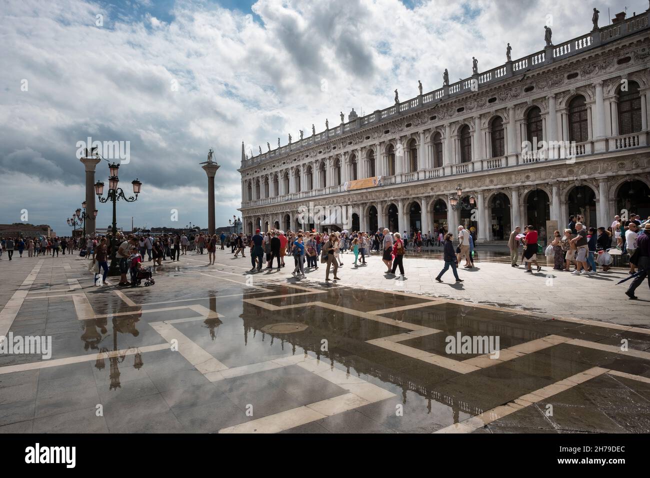Architecture of the Marciana Library reflected in flood water, Piazza ...
