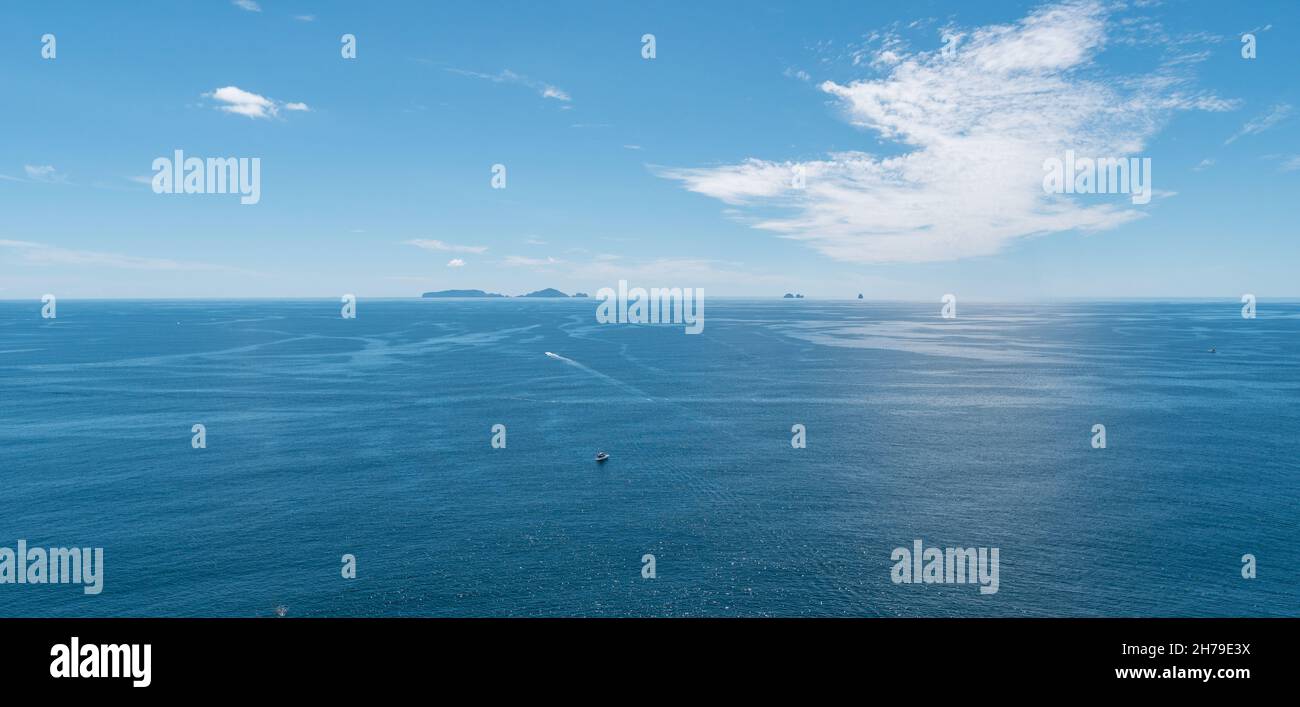 Summer blue sky and The Pacific ocean, New Zealand Stock Photo - Alamy