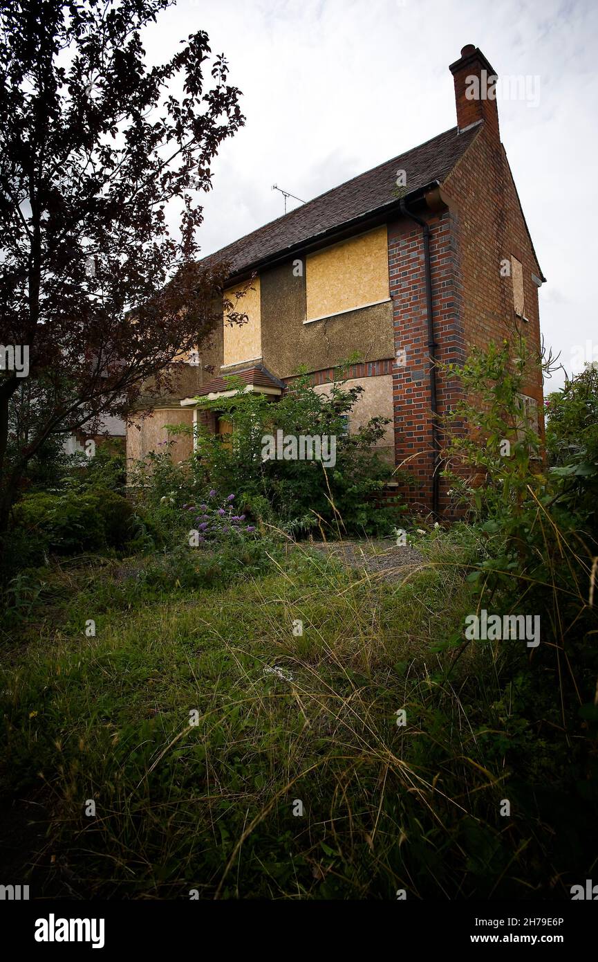 Empty and boarded up property awaiting refurbishment, Humberstone ...