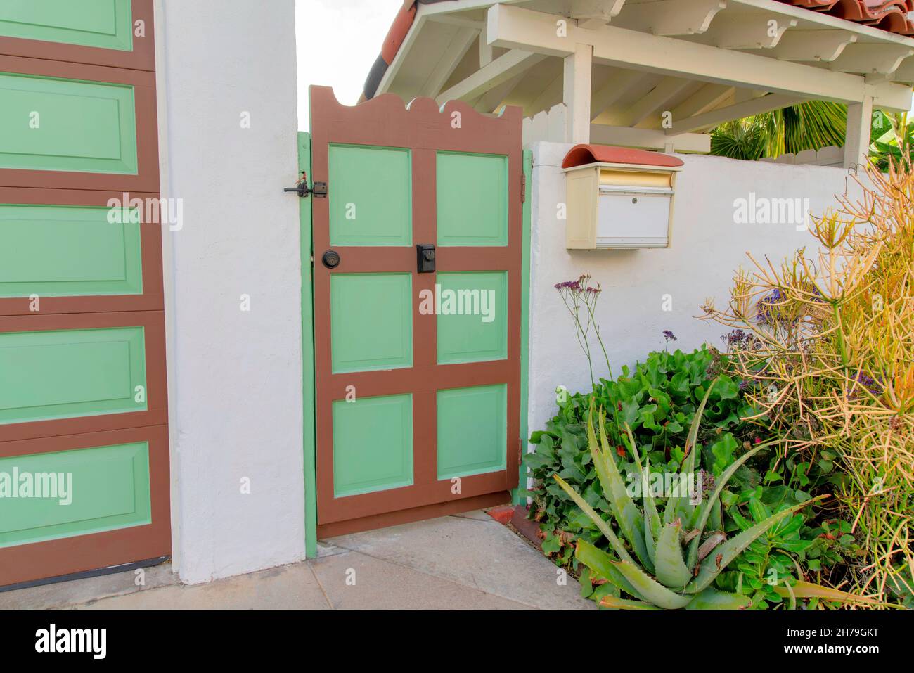 Gate with brown grid frames and green panels at La Jolla, California ...