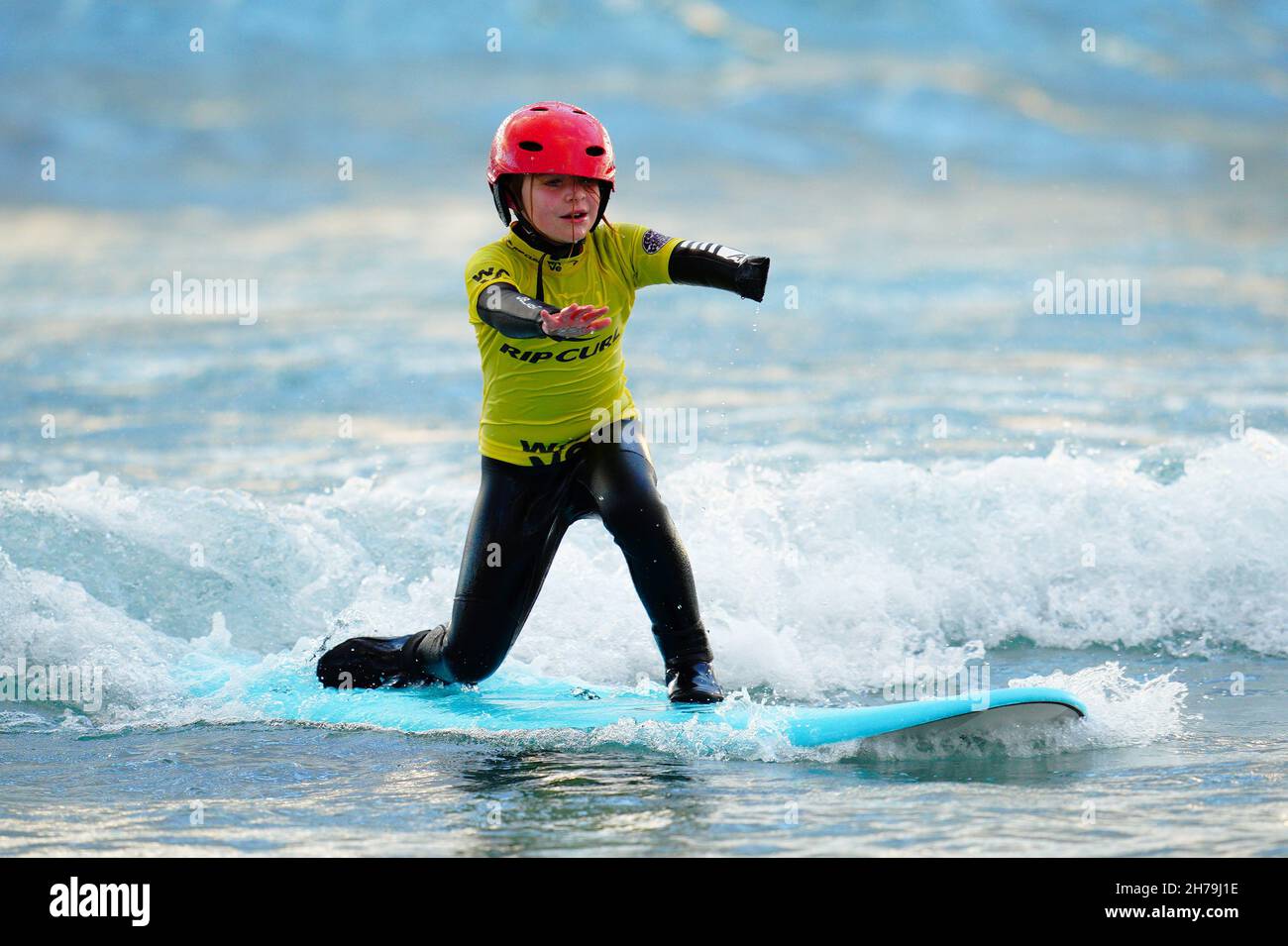 Birdy Toplis, aged nine from Somerset, surfing at The Wave in Bristol ...