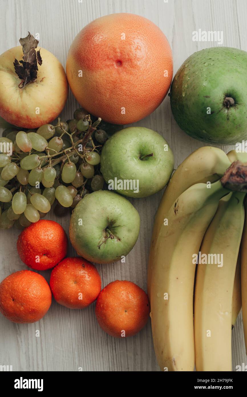 Composition with Summer Colorful Fresh Fruits on Wooden White ...