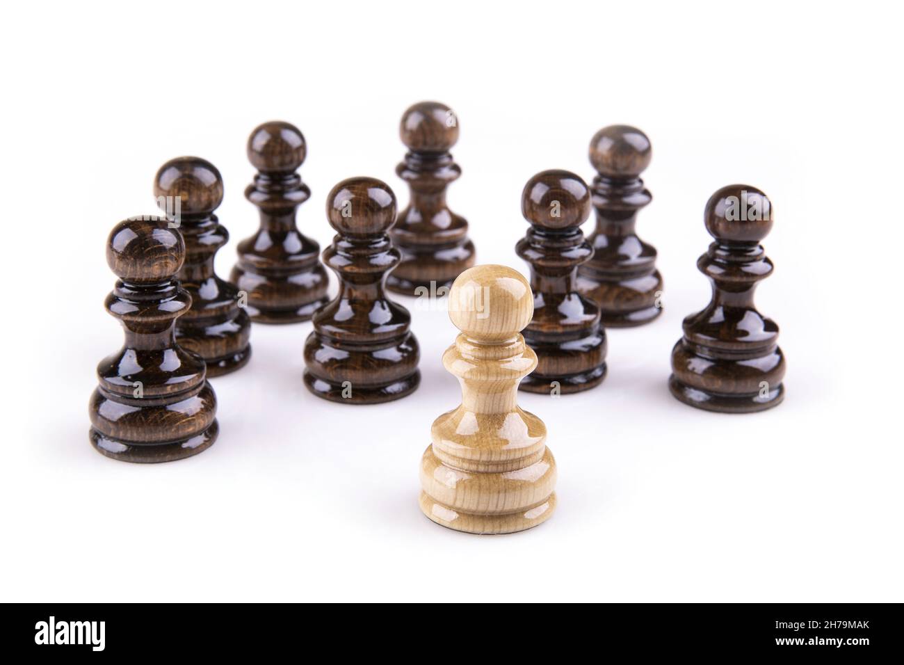 The brown chess pieces and one white pawn isolated on white background ...