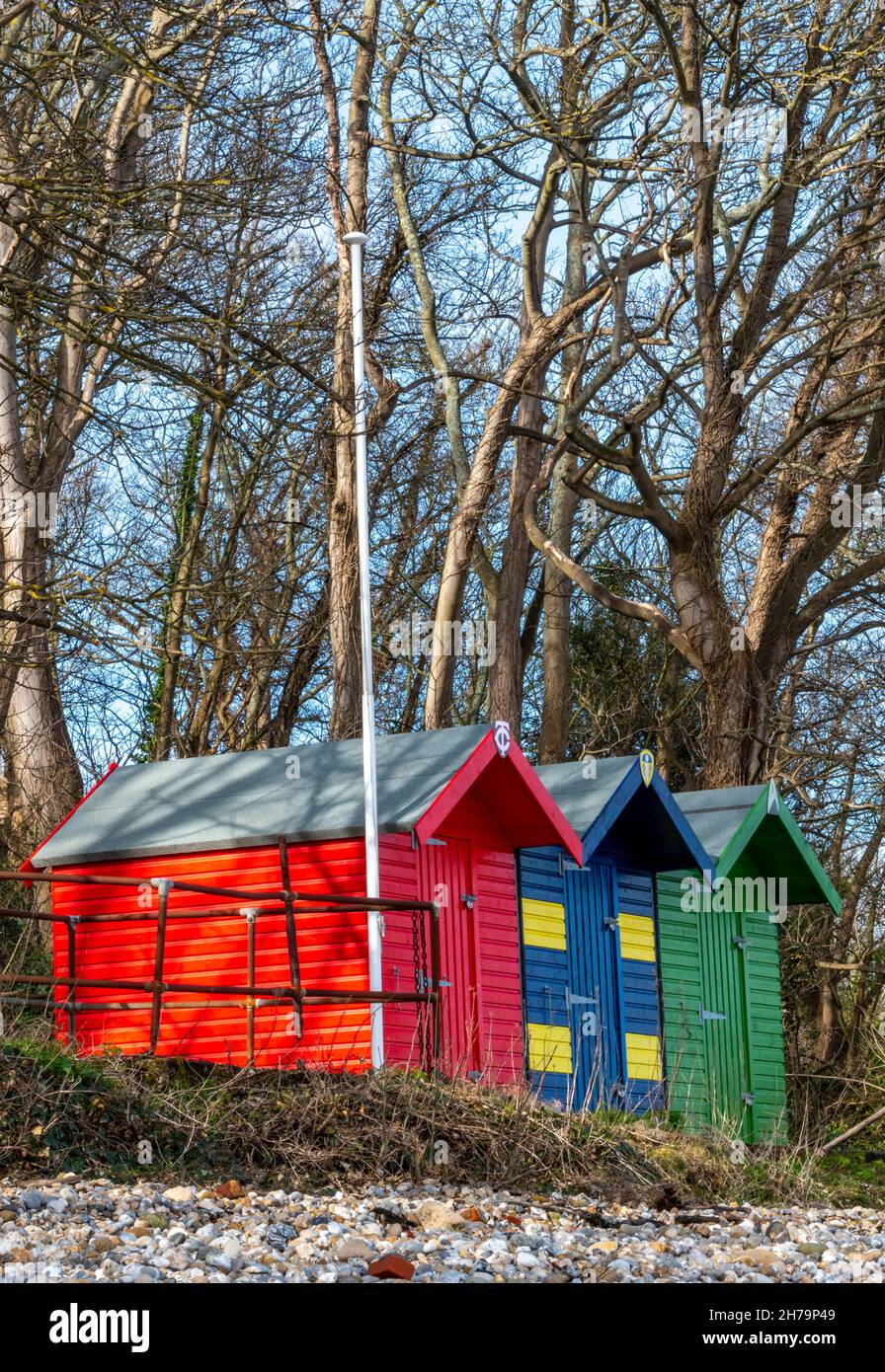 colourful brightly painted wooden beach huts at bembridge on the isle ...
