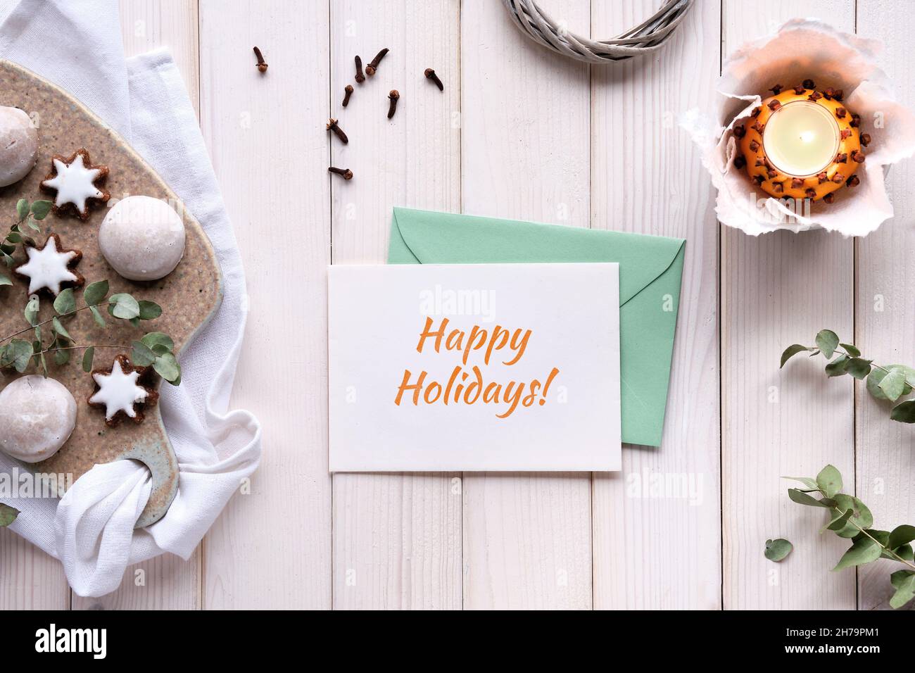 Winter greeting card. Hand hold postcard. Text Happy Holidays ...