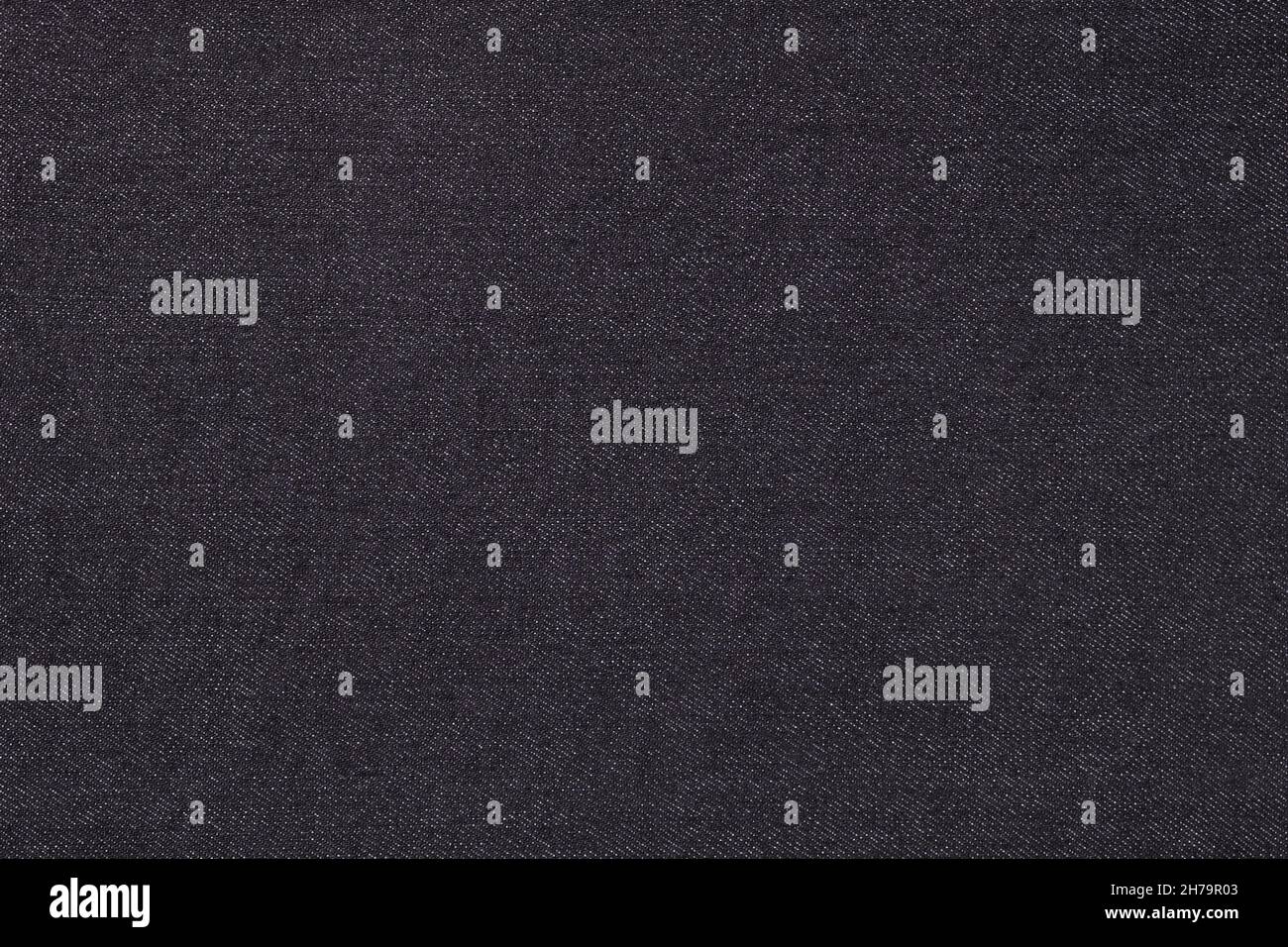 Black denim fabric texture background Stock Photo - Alamy