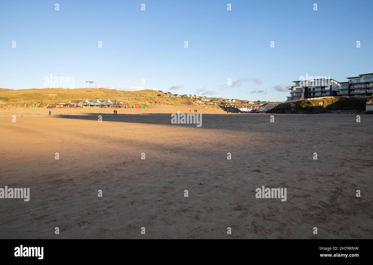 Perranporth,Cornwall,UK, 21st November 2021,Families walked along ...
