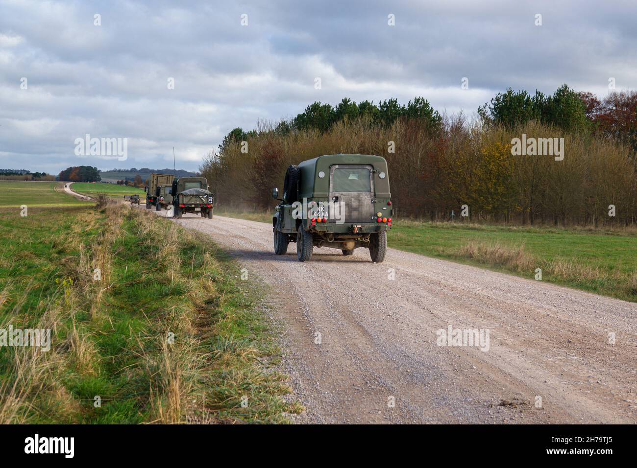 convoy of British Army Land Rover Defender Wolf medium utility vehicles ...