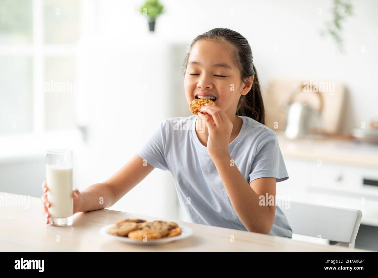 Woman Eating Cookie