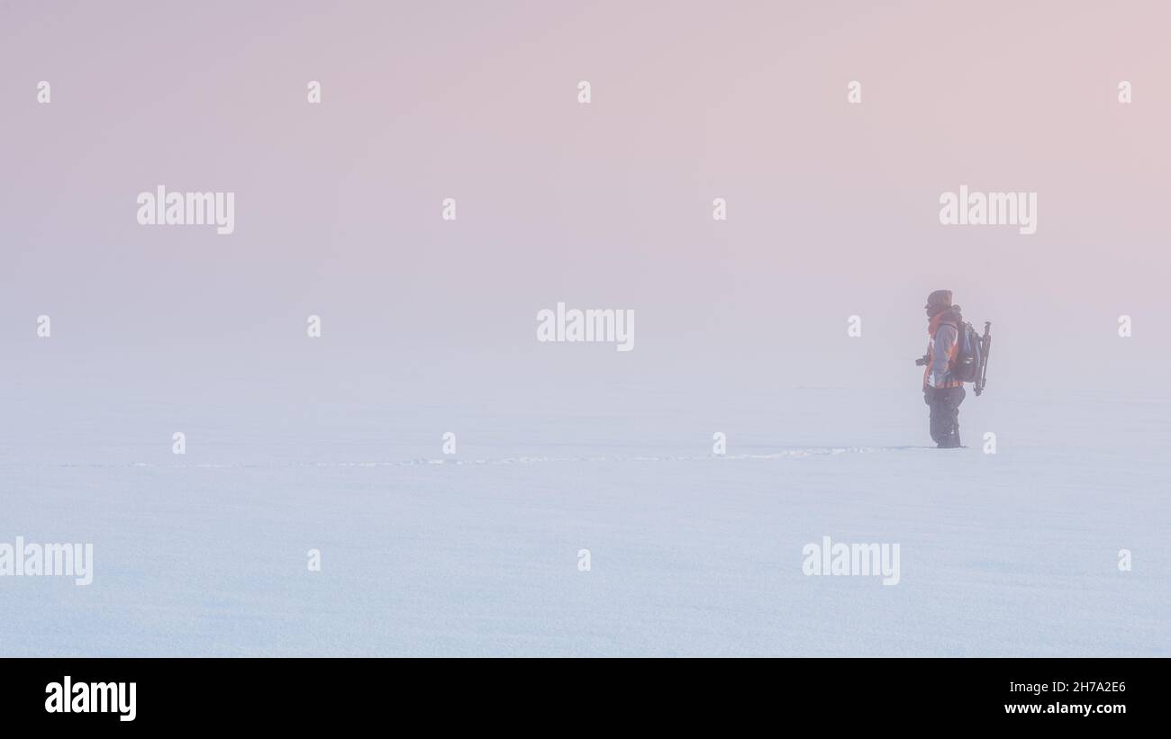 Cold winter fog and a dedicated photographer Stock Photo - Alamy