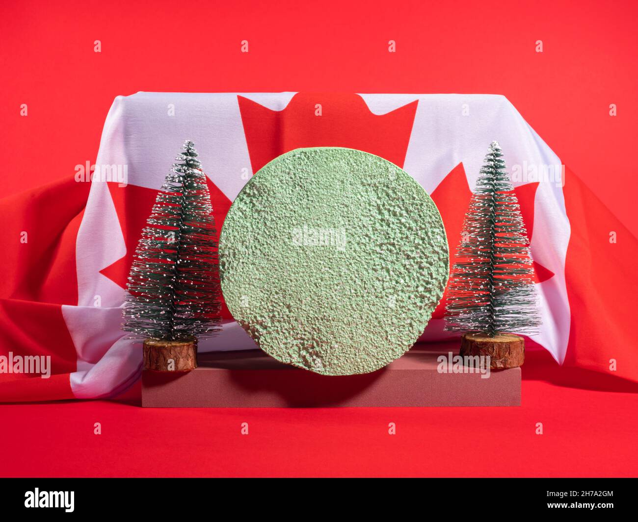 Christmas winter podium mockup on red background with canadian flag ...