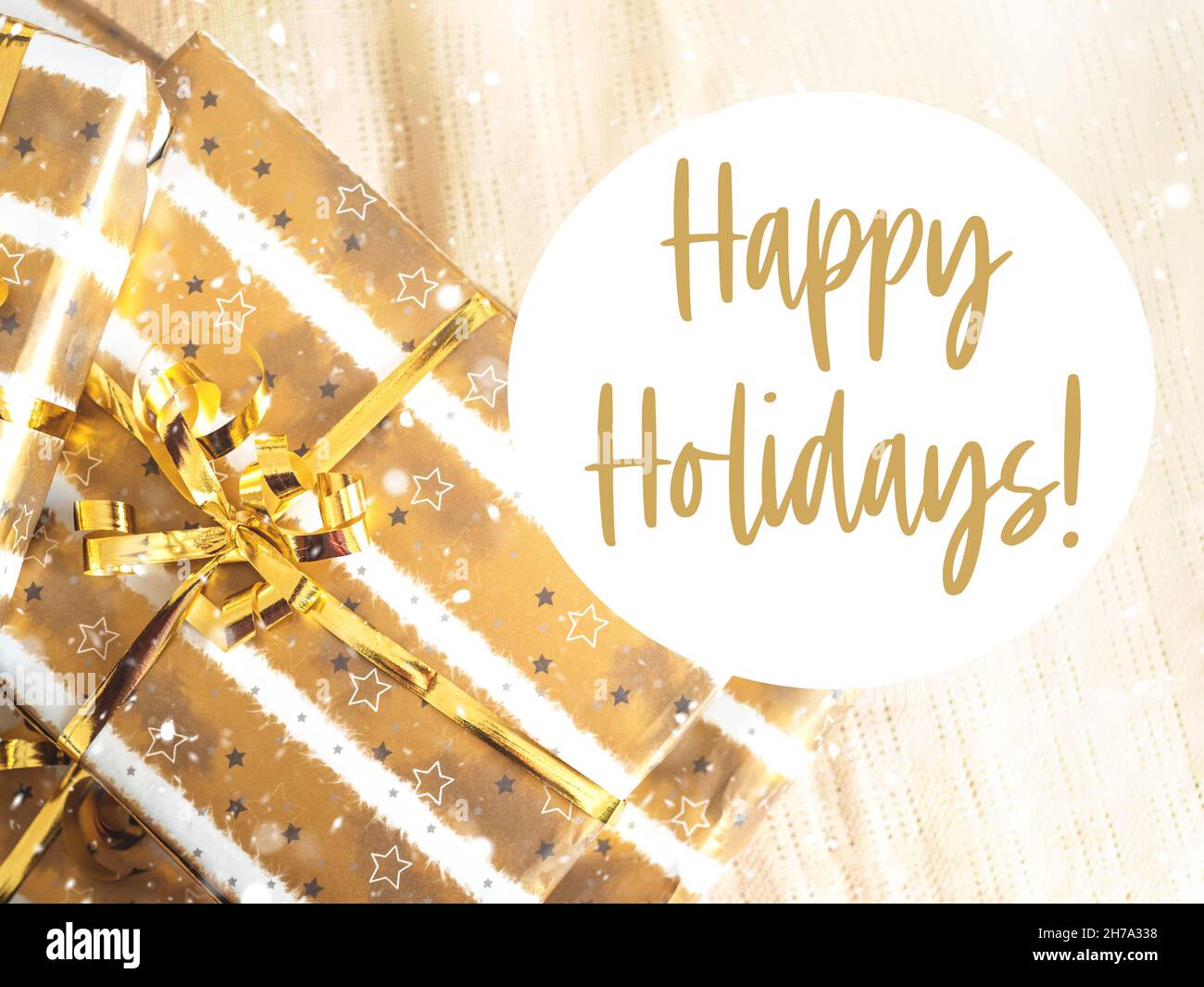 Christmas stack of golden wrapped gift boxes, text happy holidays Stock ...